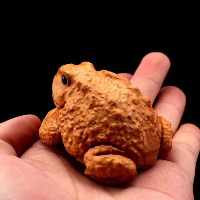 Cliff-cypress-handmade-wood-carving-golden-toad-holding-ball-ornaments ...