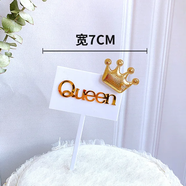 Create a regal cake with queen cake decorations fit for royalty