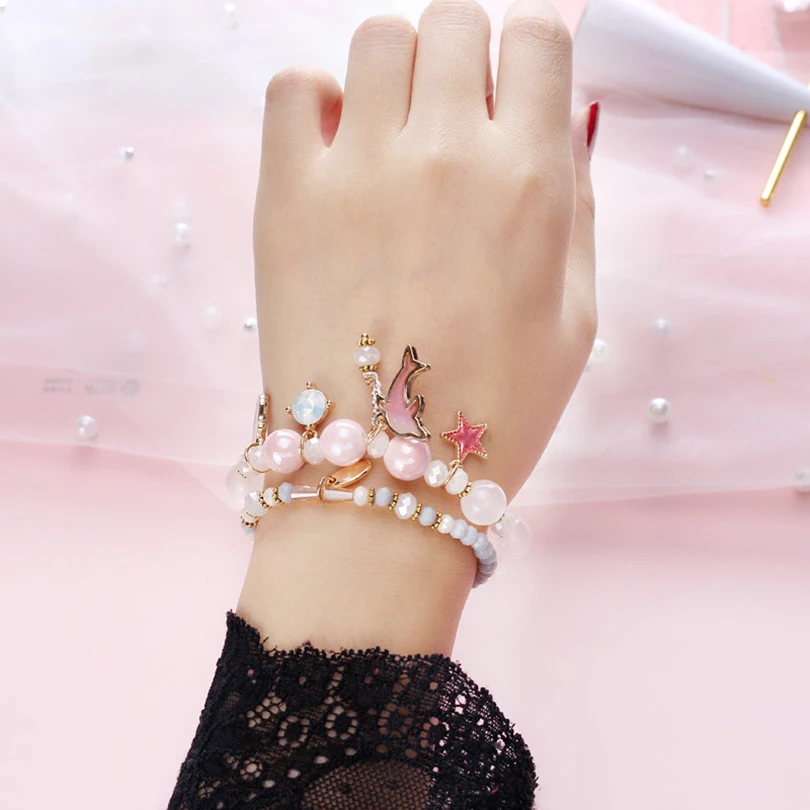 Girls Hand With Bracelets