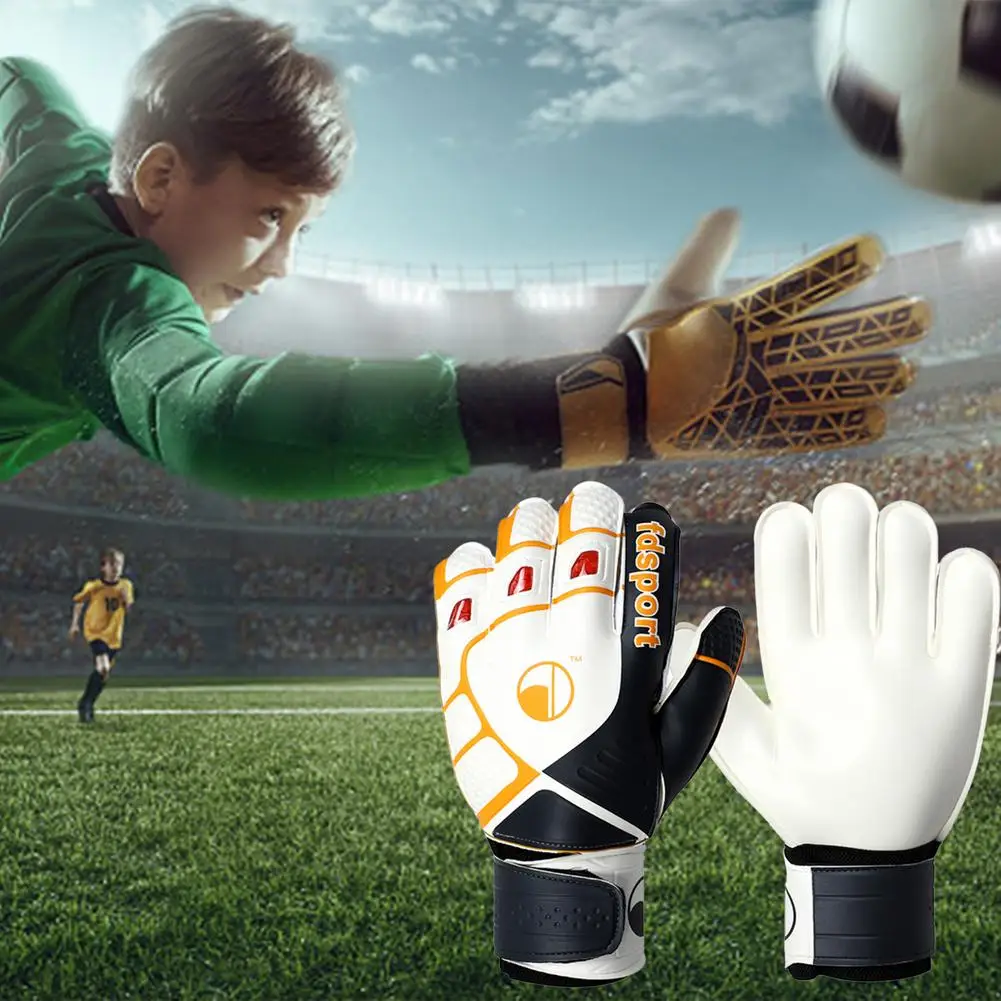 Soccer Goalie Gloves Holding A Ball