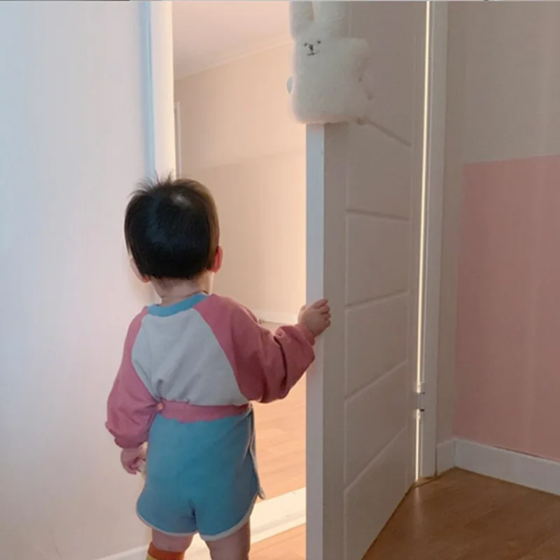 Child Closing Door