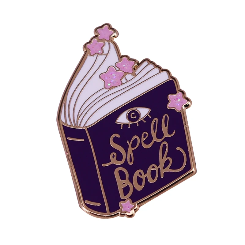 This lovely spell book pin with pink glitter star embellishments is the ...
