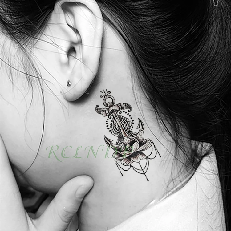 Simple Lotus Flower Tattoo Behind Ear