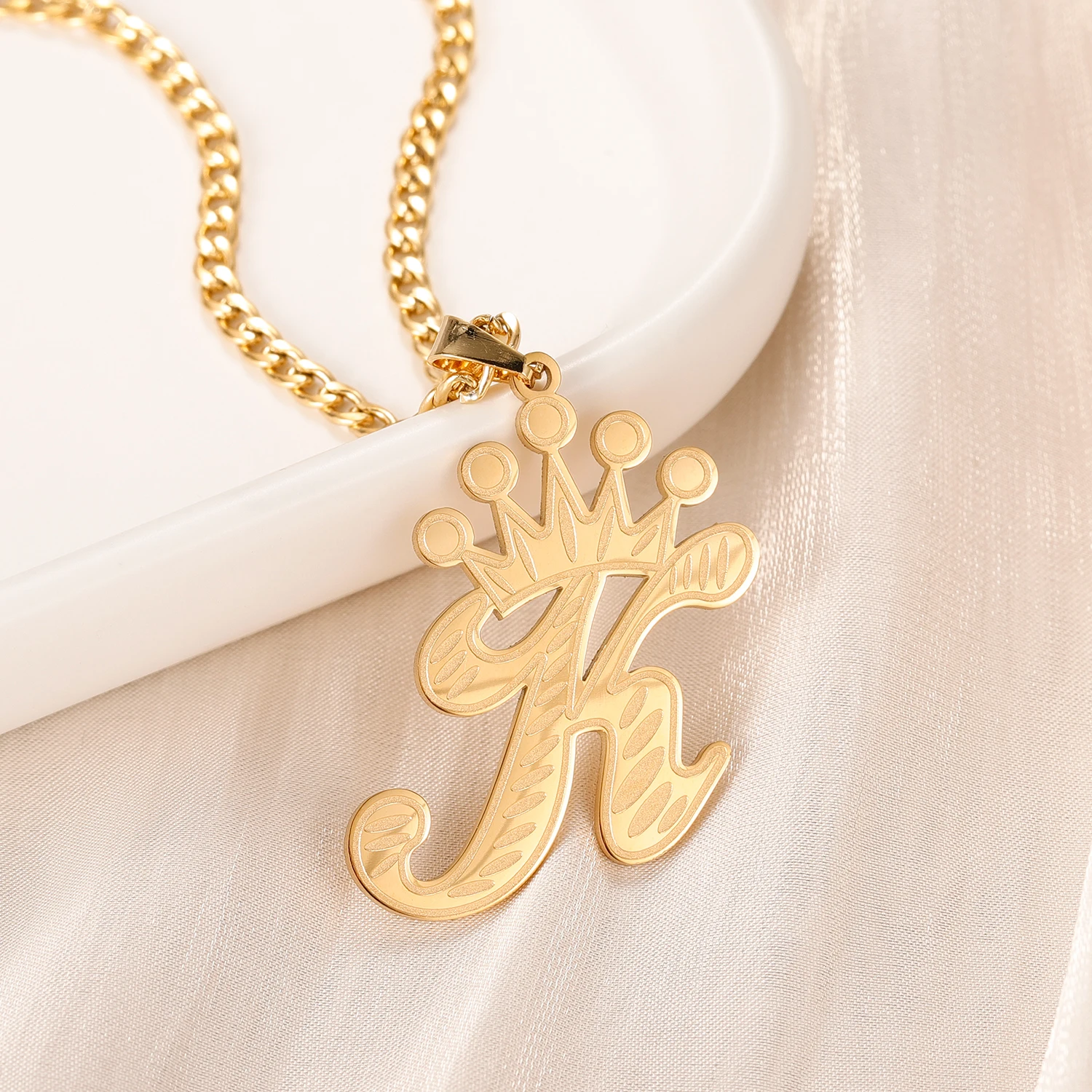 K pendant with crown store