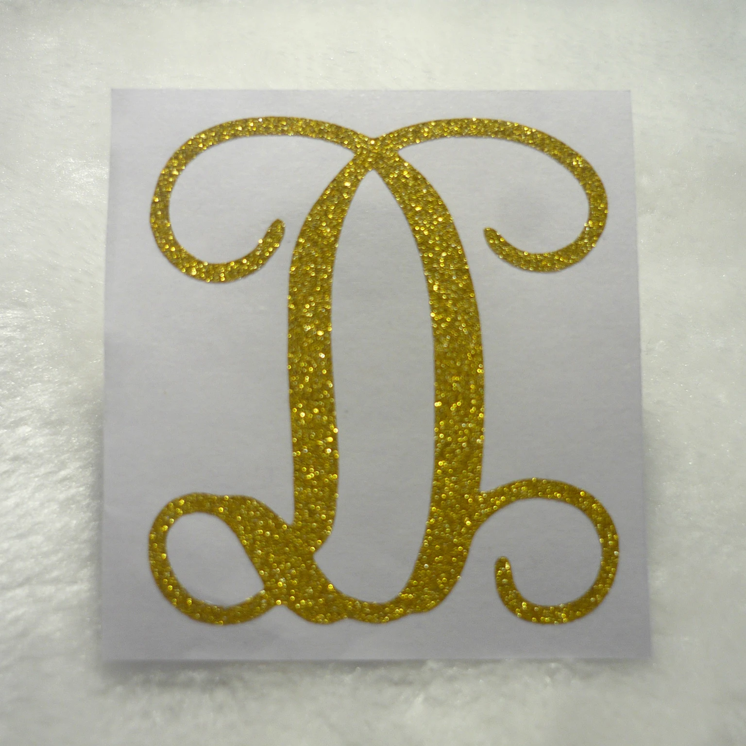 The Letter D In Gold Glitter