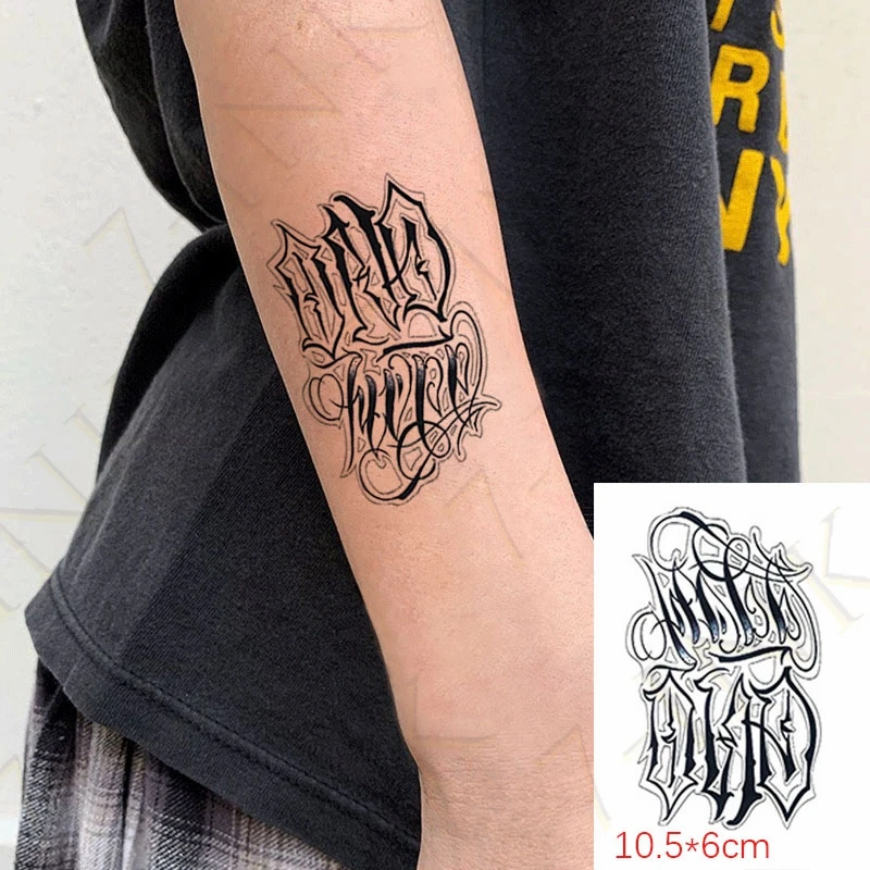 Old English Font Tattoo On Arm