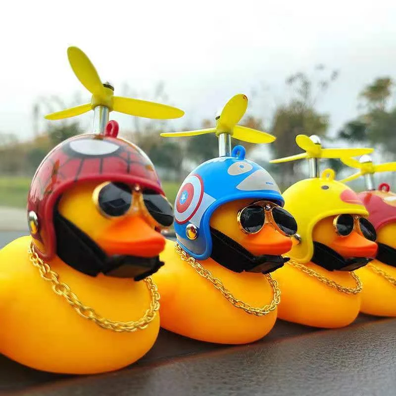 Car Cute Little Yellow Duck With Helmet Propeller Windbreaking Wave ...