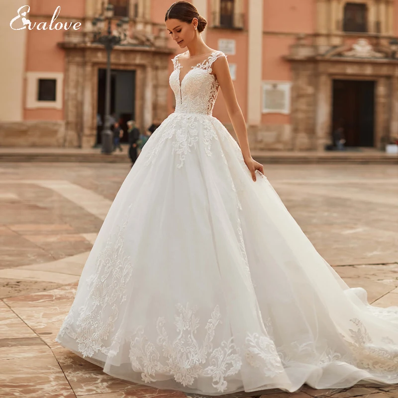Evalove 매력적인 캡 슬리브 아플리케 맞춤형 A 라인 웨딩 드레스 럭셔리 구슬 국자 목 등이없는 공주 신부 가운결혼식