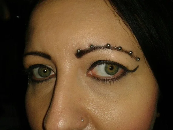 Double Horizontal Eyebrow Piercing