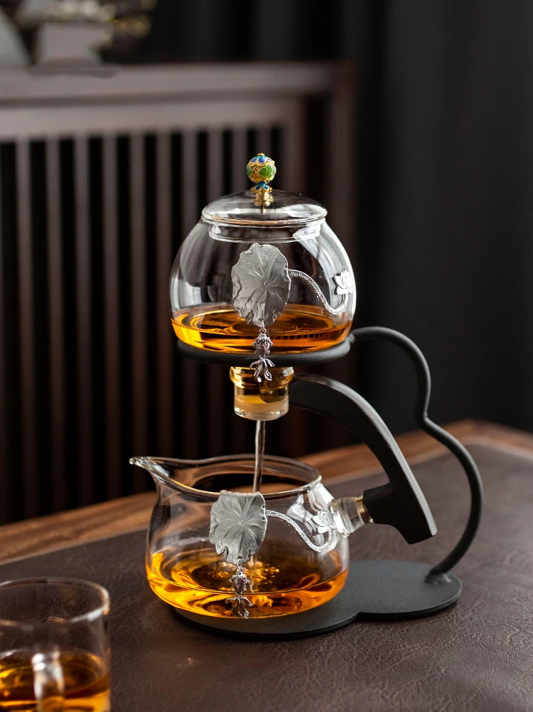 Heat-resistant glass tea set magnetic water diversion rotating cover ...
