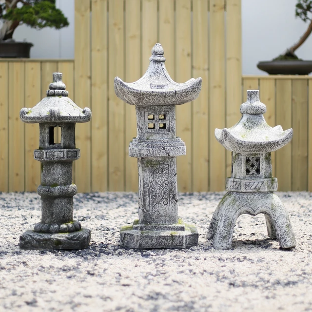 Japanese Stone Statues In Landscape