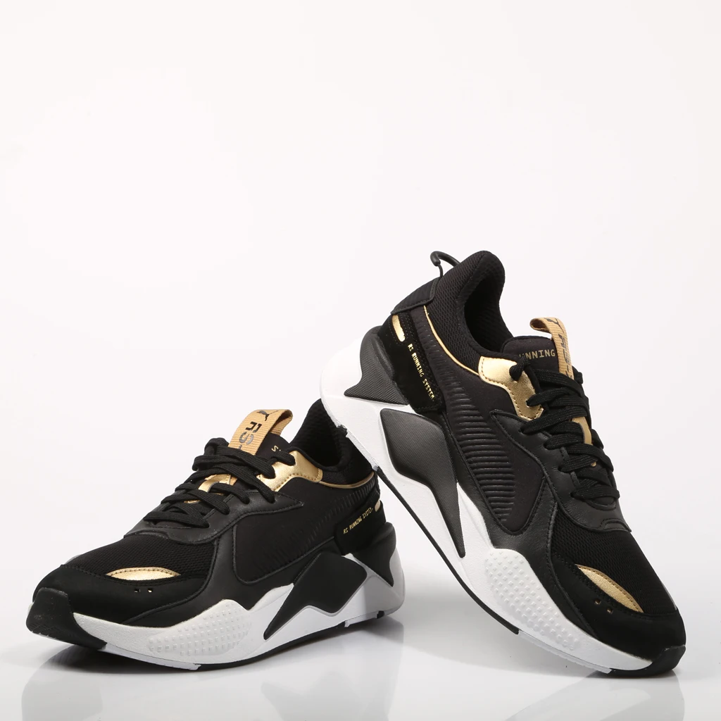 Venta > zapatillas puma negra con dorado > en stock
