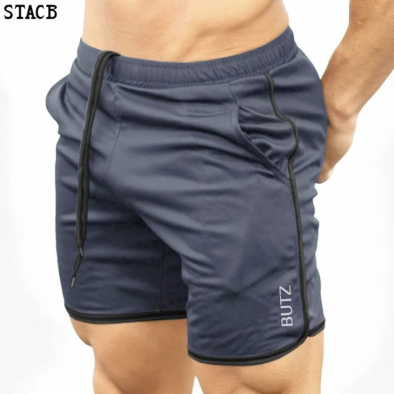 New Fashion Men Shorts Compression Fast Drying Bodybuilding Sweatpants