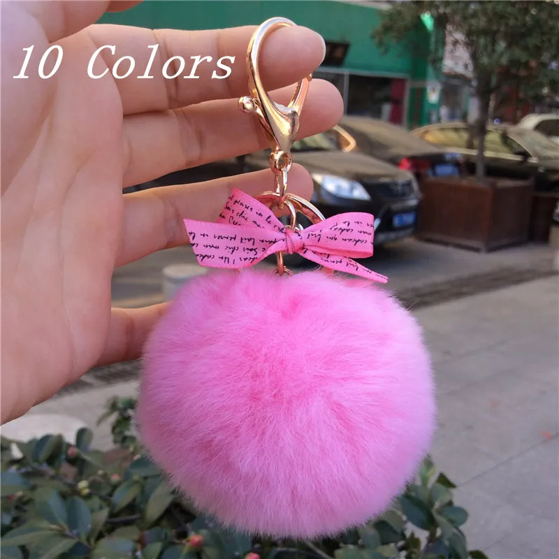 What is this pink fuzz ball, it seems to have came off a fallen Grey ...