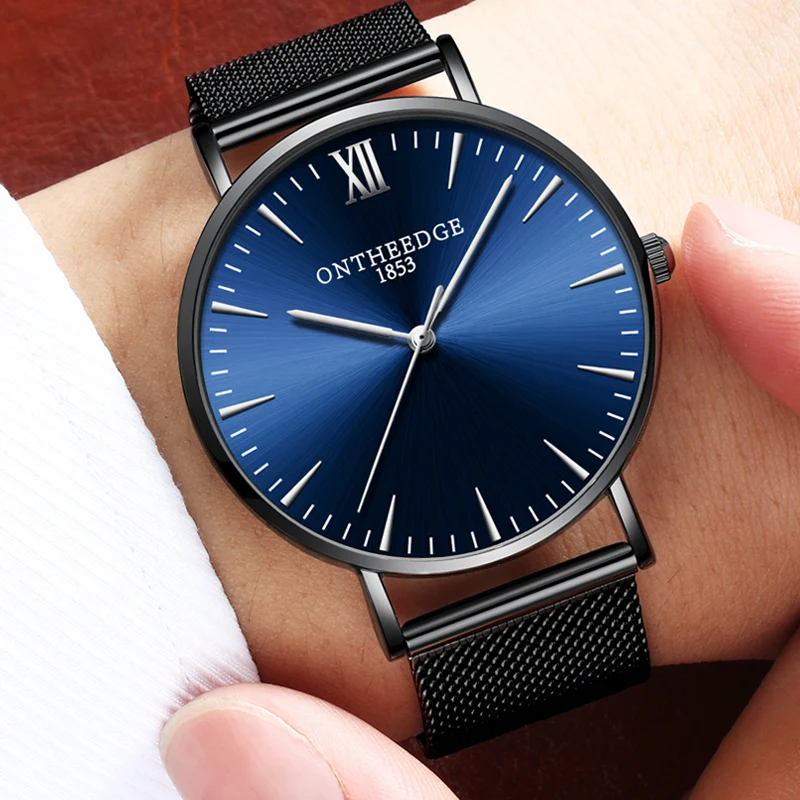 Brand men 's quartz watch waterproof ultra thin body body soft mesh ...