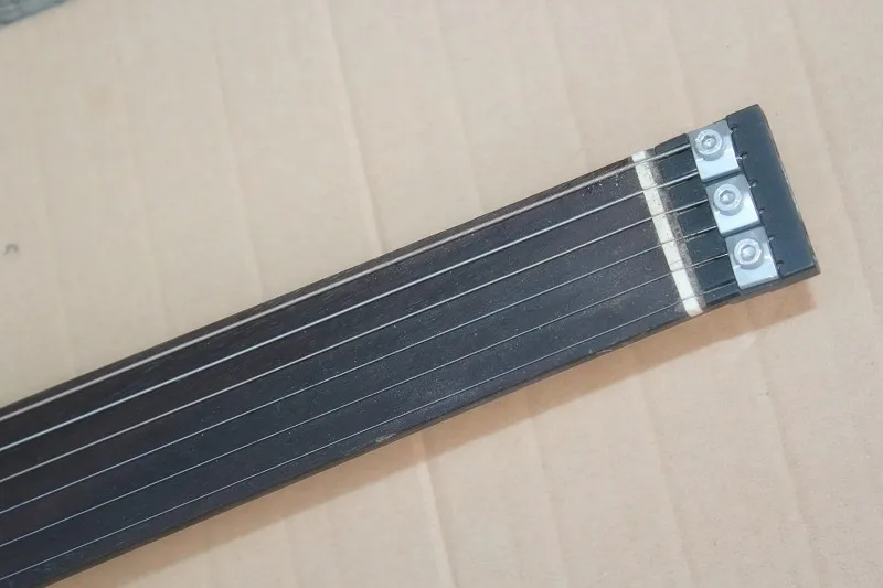 Factory wholesale matte black Anchor shape headless electric guitar ...