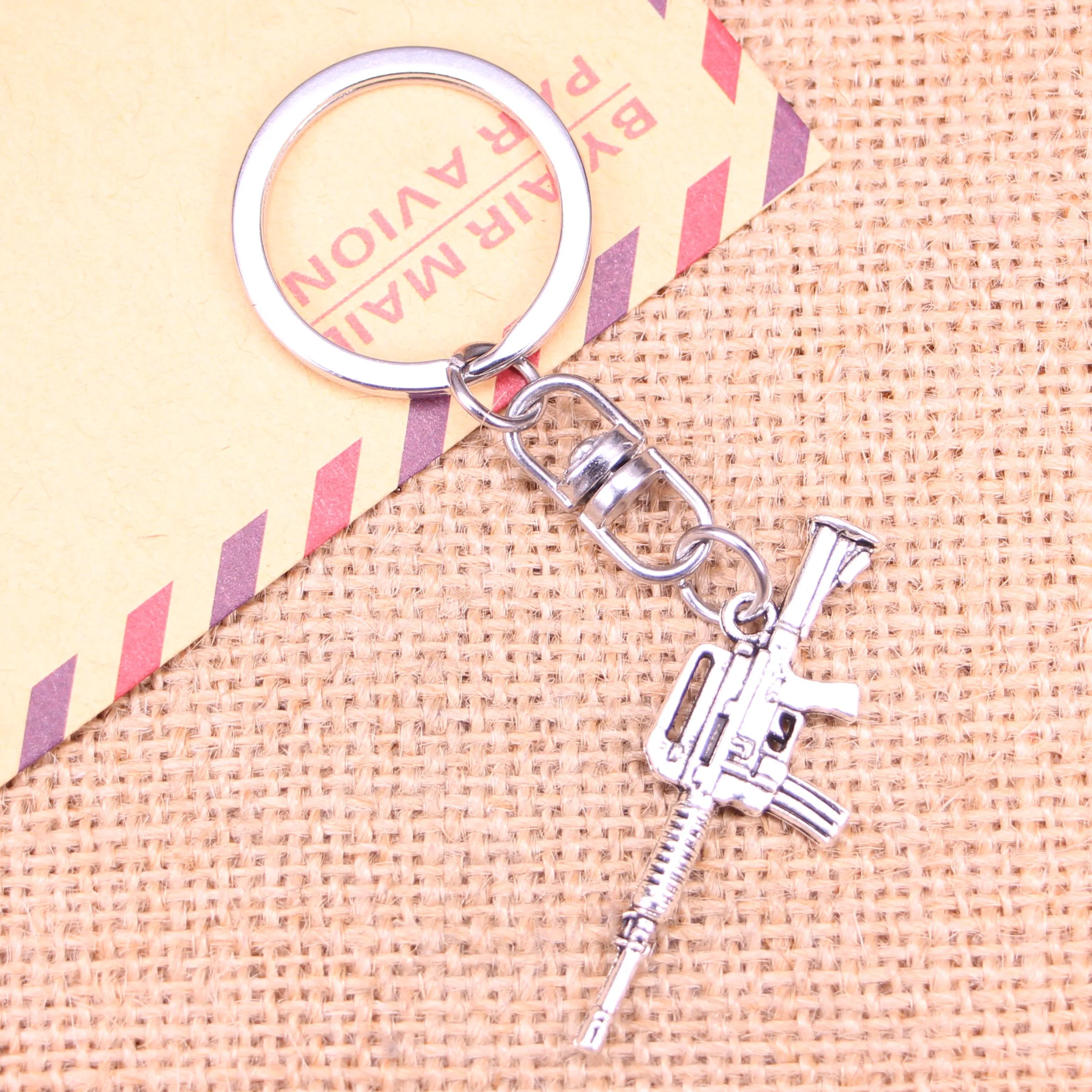 20pcs New Fashion Keychain 45x16mm machine gun assault rifle Pendants ...