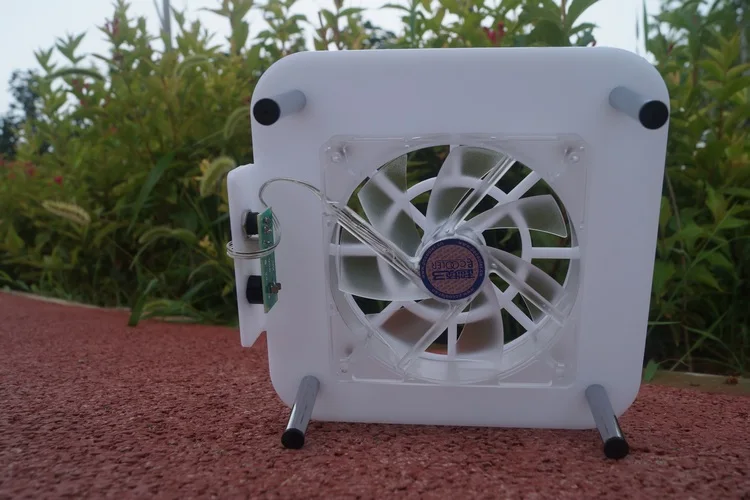 Anyone try one of these from China Mac Mini cooler | MacRumors Forums