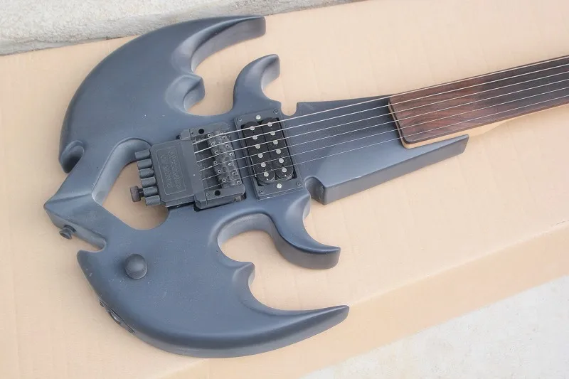 Factory wholesale matte black Anchor shape headless electric guitar ...