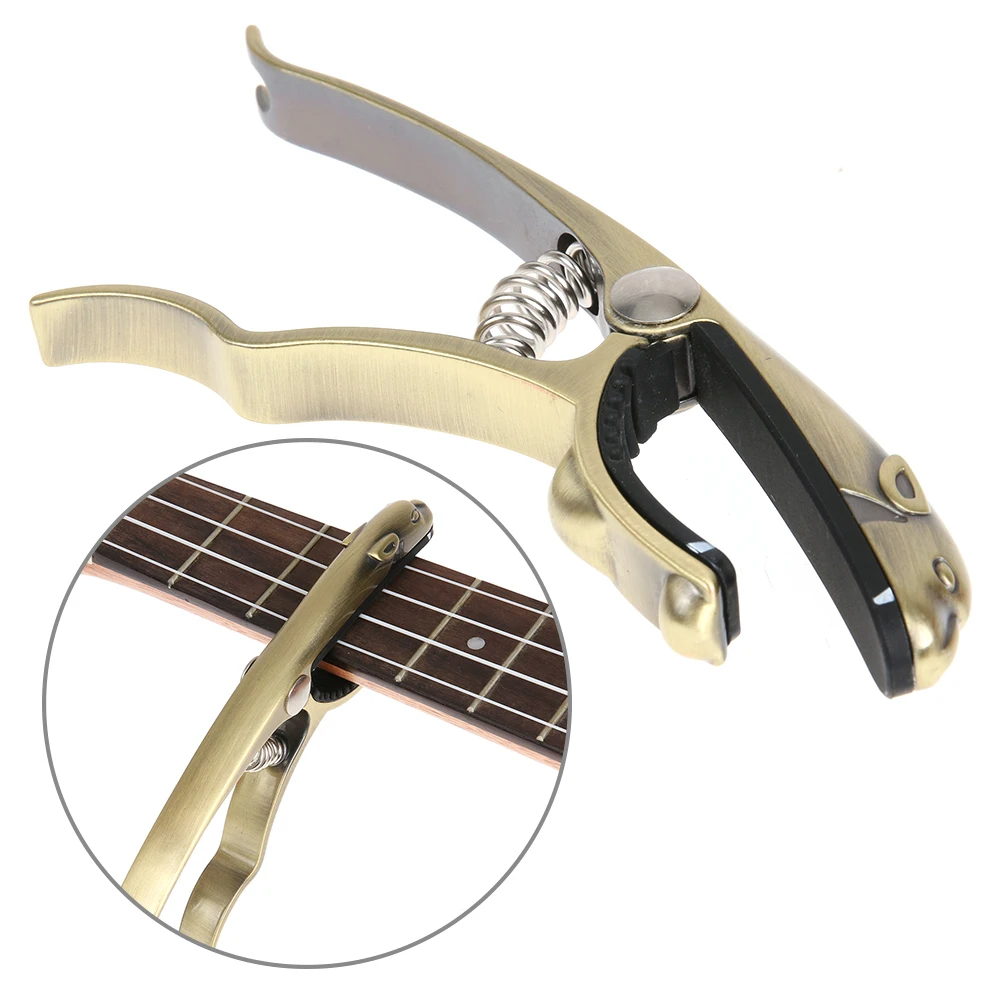Jaguar Capo - Spring Clamp Metal Capo in Jaguar Style, Gold & Black ...
