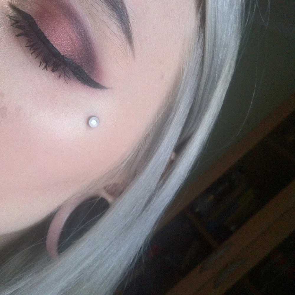 Microdermal Forehead Piercing