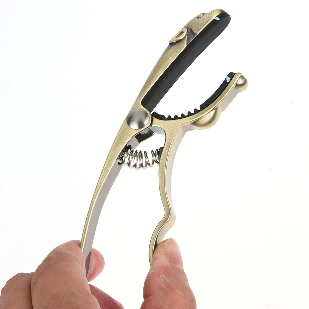 Jaguar Capo - Spring Clamp Metal Capo in Jaguar Style, Gold & Black ...