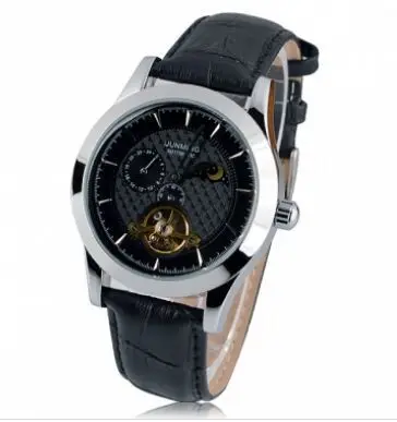 Brand of top class junming wrist watch Classic reproduce on woodwork ...