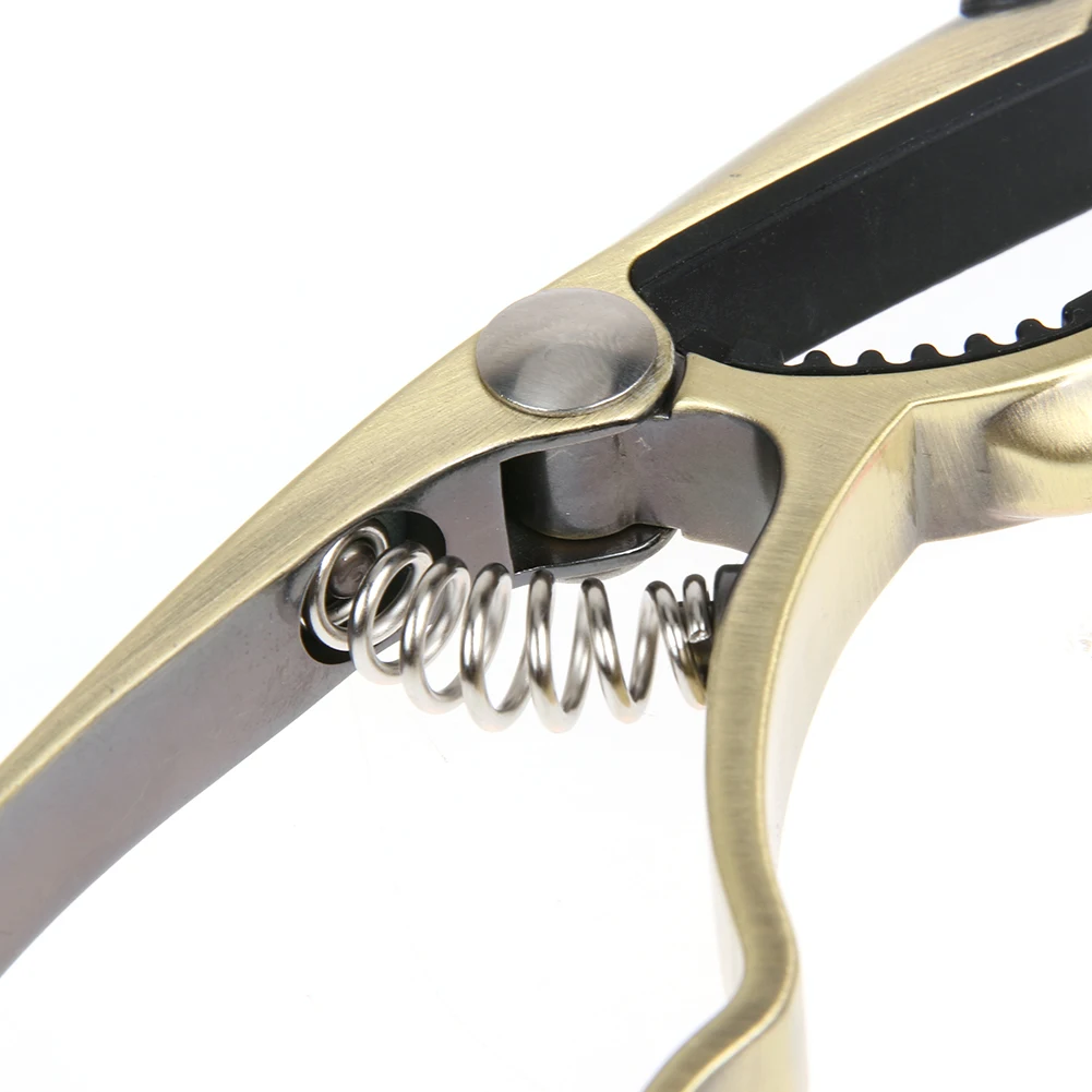 Jaguar Capo - Spring Clamp Metal Capo in Jaguar Style, Gold & Black ...