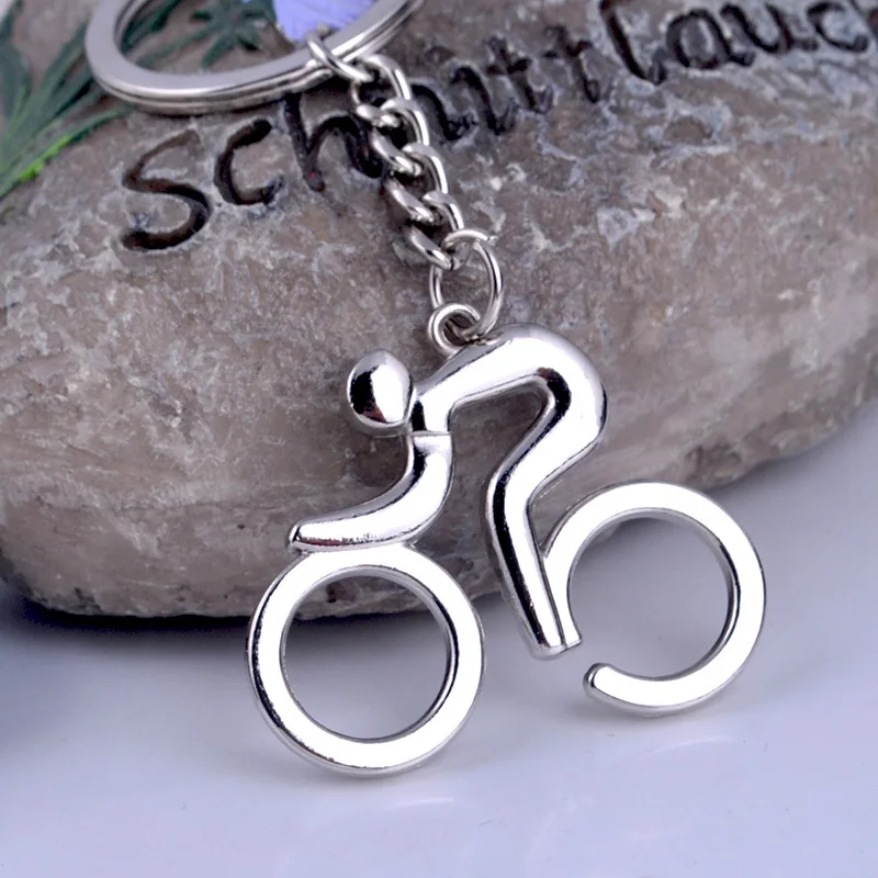 (12 pieces/lot)Fashion Personality Olympic Games Man Ride On Bicycle ...