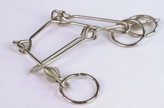 Classic Metal Brain Teaser Challenging Iron Wire Puzzle Magic Toys For ...