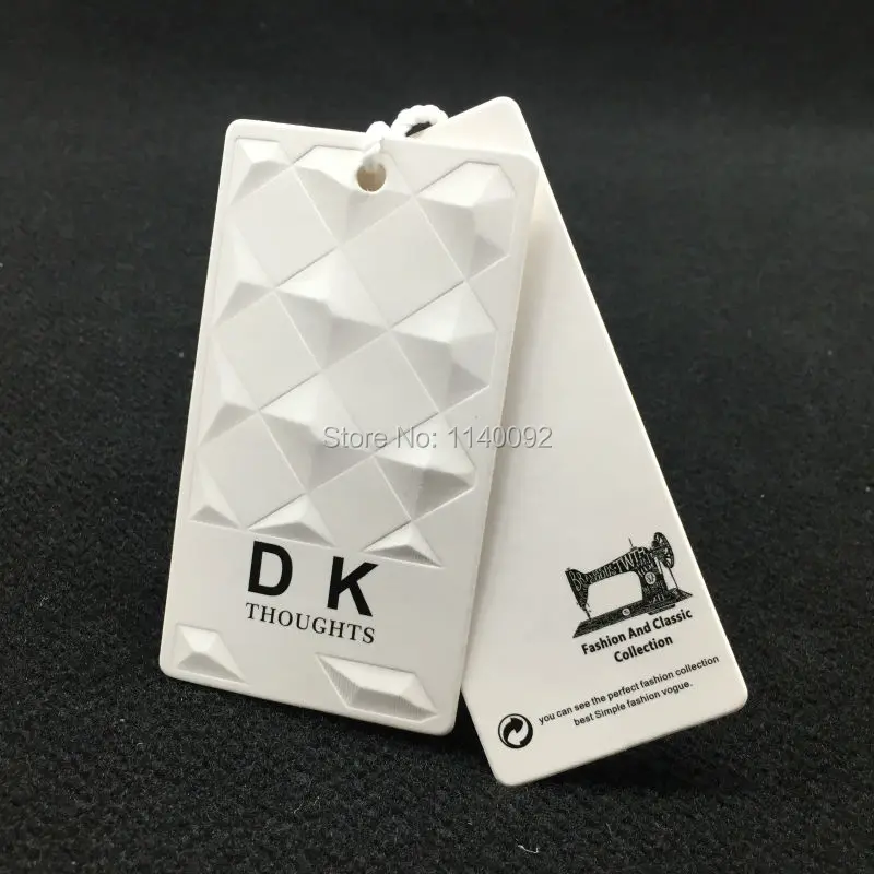 Customized top quality clothing embossed tags/garment shape cutting ...