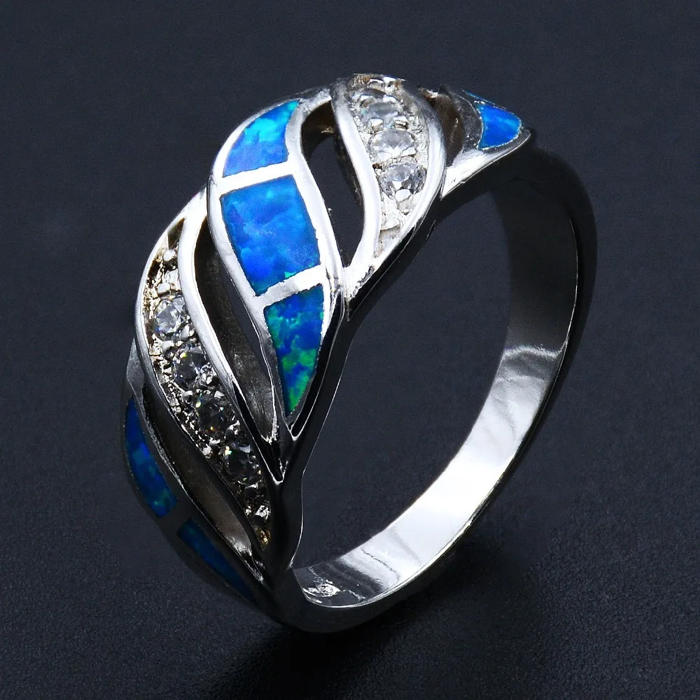 Charming Ocean Blue Fire Opal Ring With Rhodium Plating - Rings ...