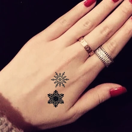 Snowflake Tattoo Finger