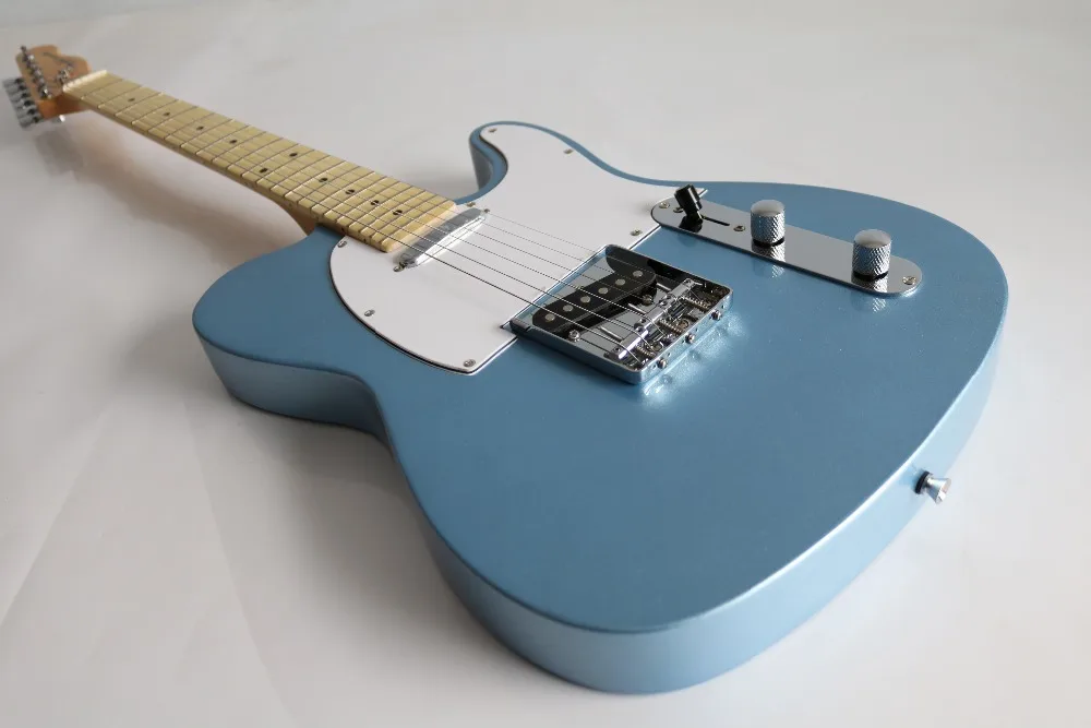 New custom light blue guitar, maple fingerboard, white guard board, can ...