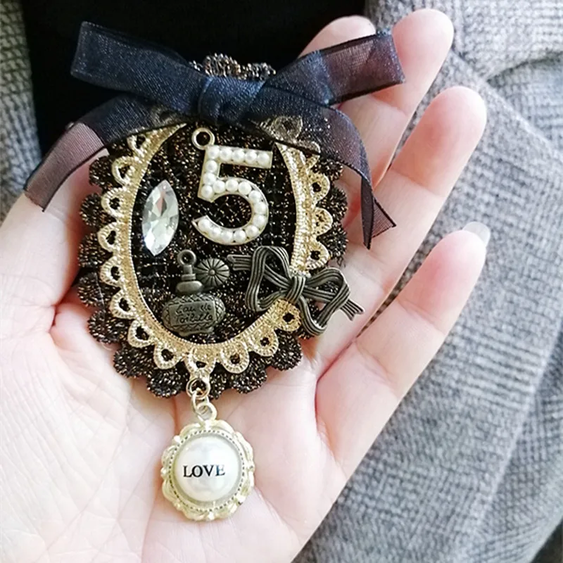 Luxury Autumn And Winter design number 5 brooch Retro Love Pearl Bow ...