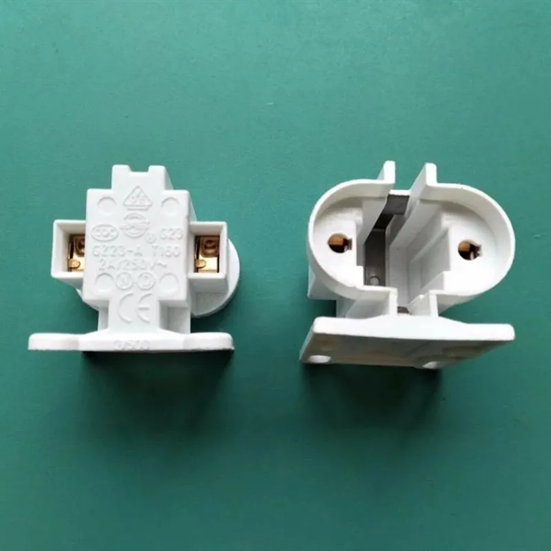 2pcs-G23-plastic-lamp-holder-wholesale.jpg