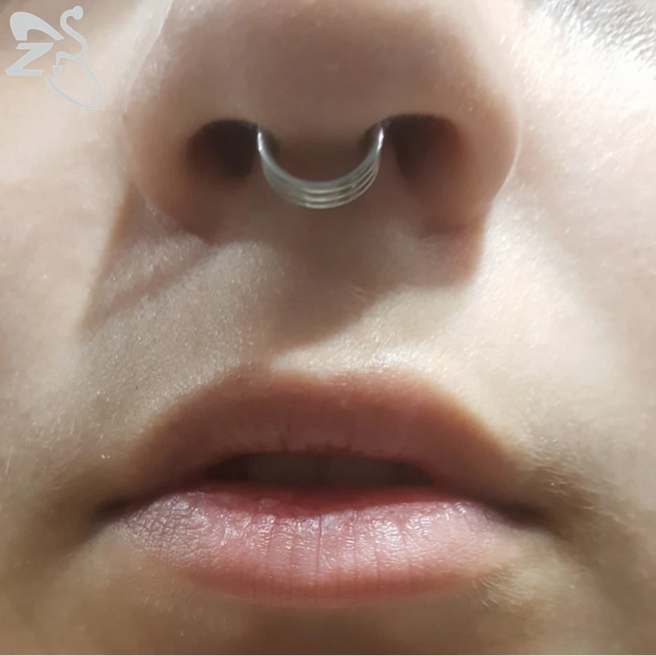 Saddle Nose From Septum Piercing