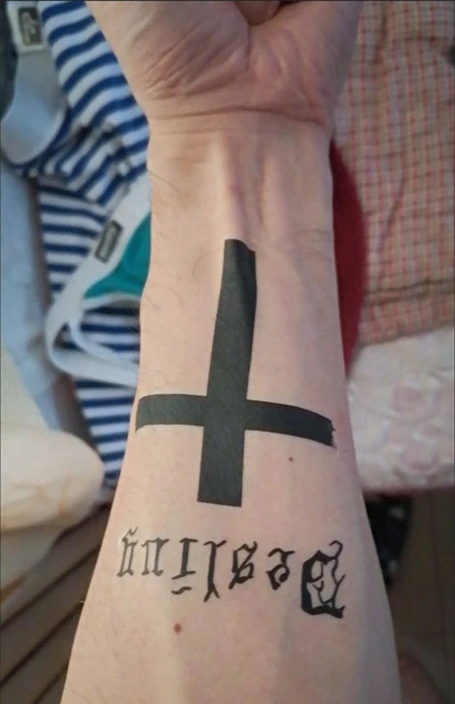 Upside Down Cross Tattoo On Wrist