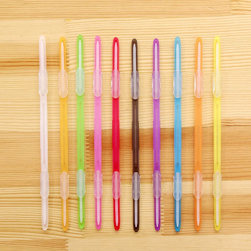 A pack of 10 sets of plastic binding clips with two holes loose-leaf ...