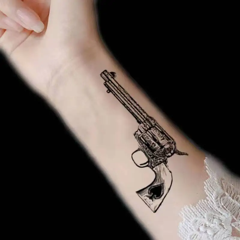 Crossed Revolvers Tattoo