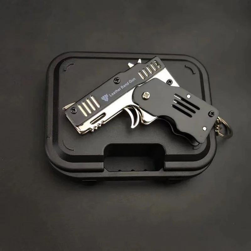 Mini pistola de couro, arma de bala dobrável, de borracha de metal ...