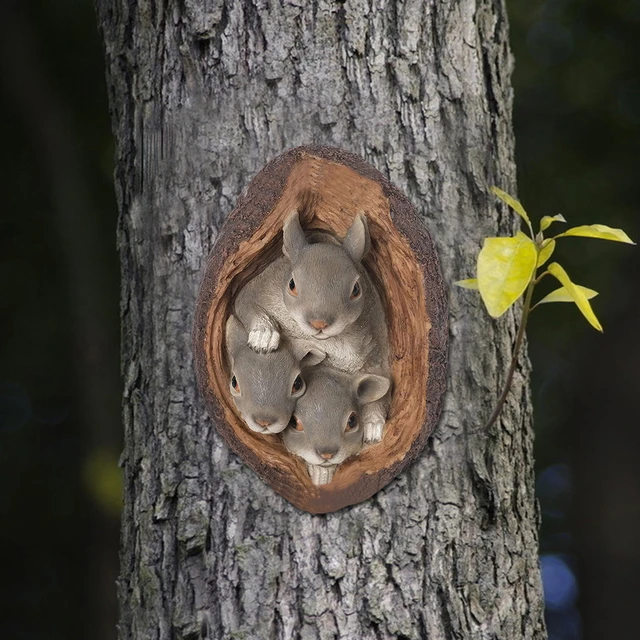 Cartoon Squirrel In A Tree Hole