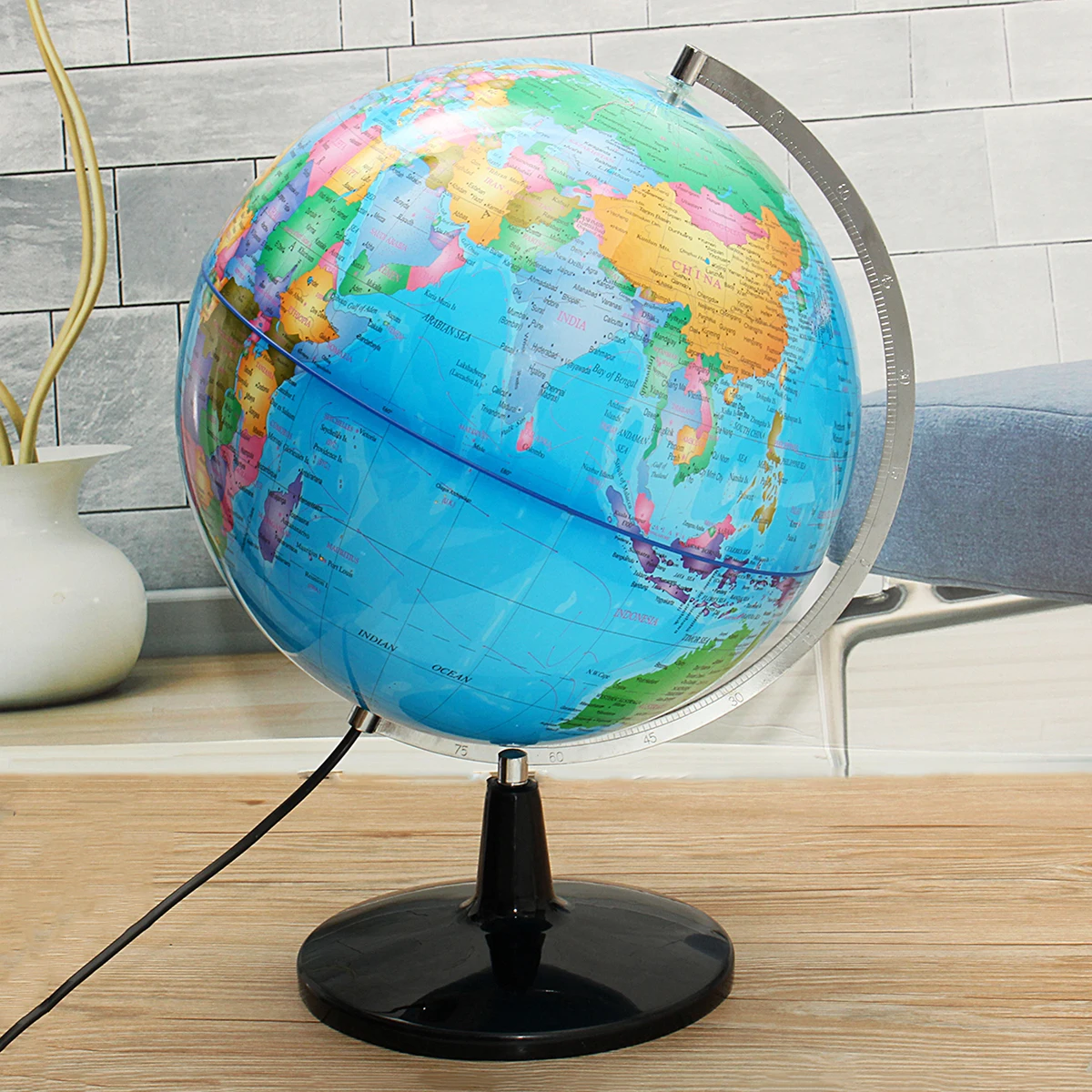 Large World Globe Displays World's Largest Rotating And Revolving