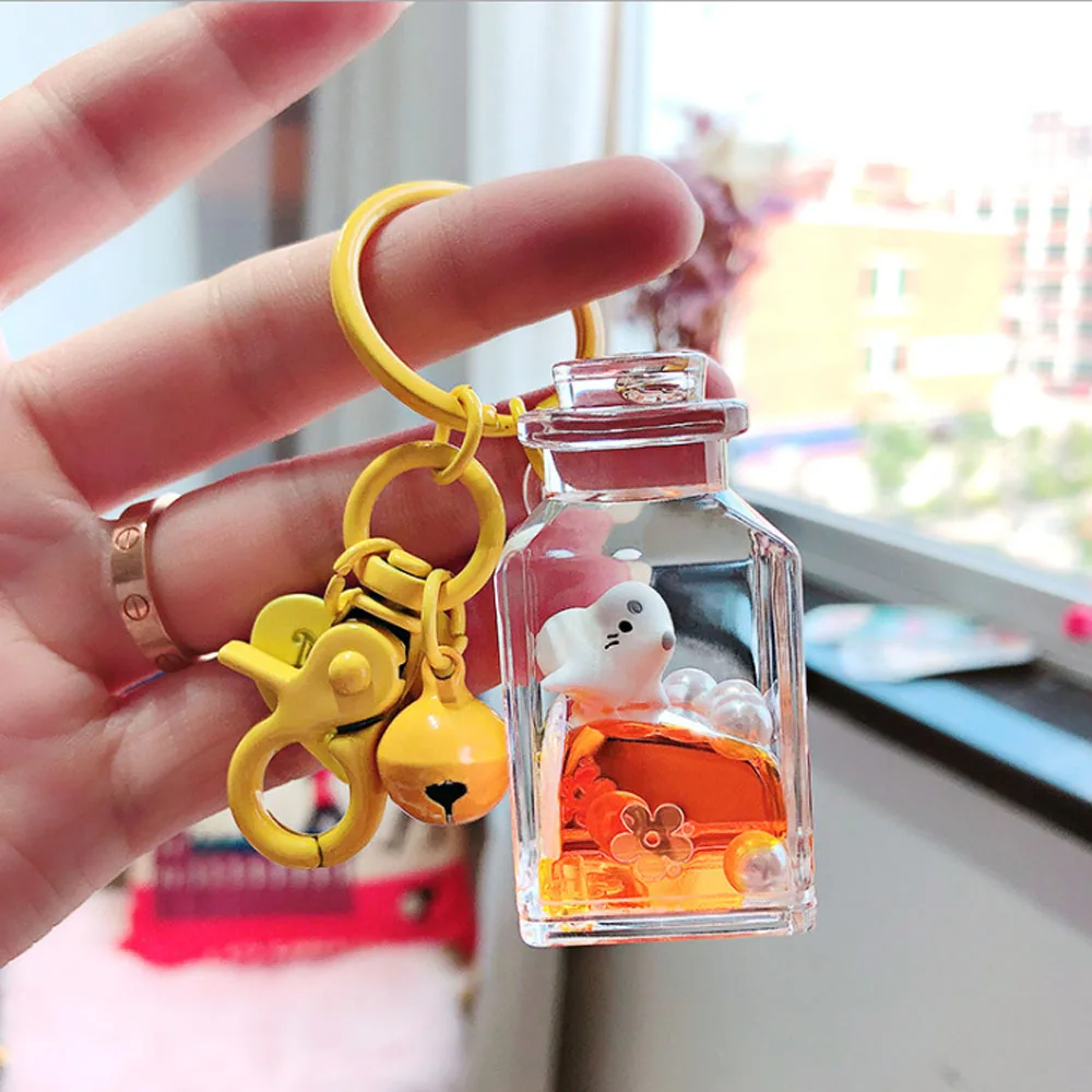 เกาหลีน่ารัก Moving Liquid Key Chain รถ Marine Life Quicksand ขวดพวง ...