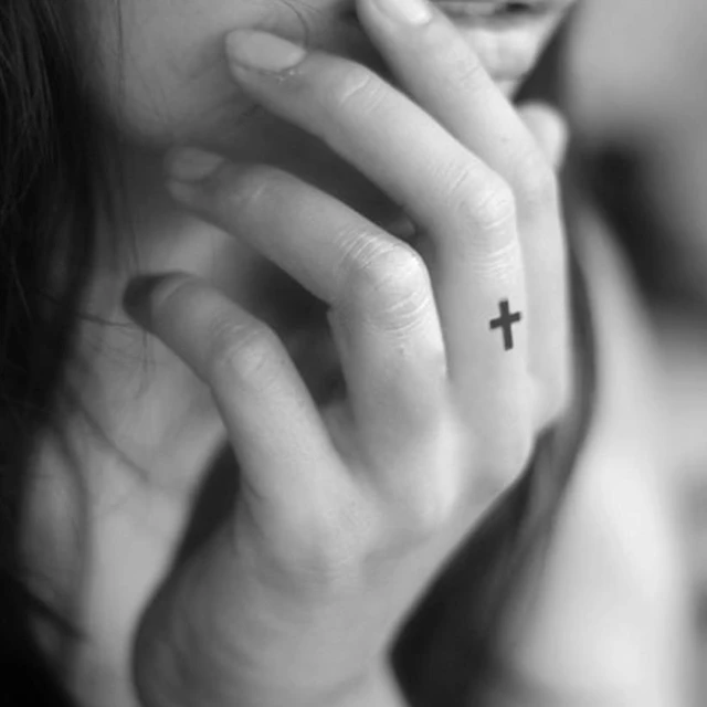 White Cross Tattoos On Wrist