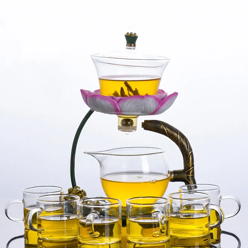 New glass tea set lotus magnetic water diversion rotating cover bowl ...