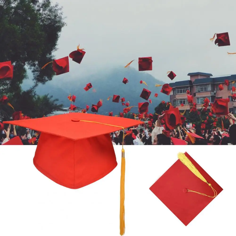 Red Graduation Caps In The Air