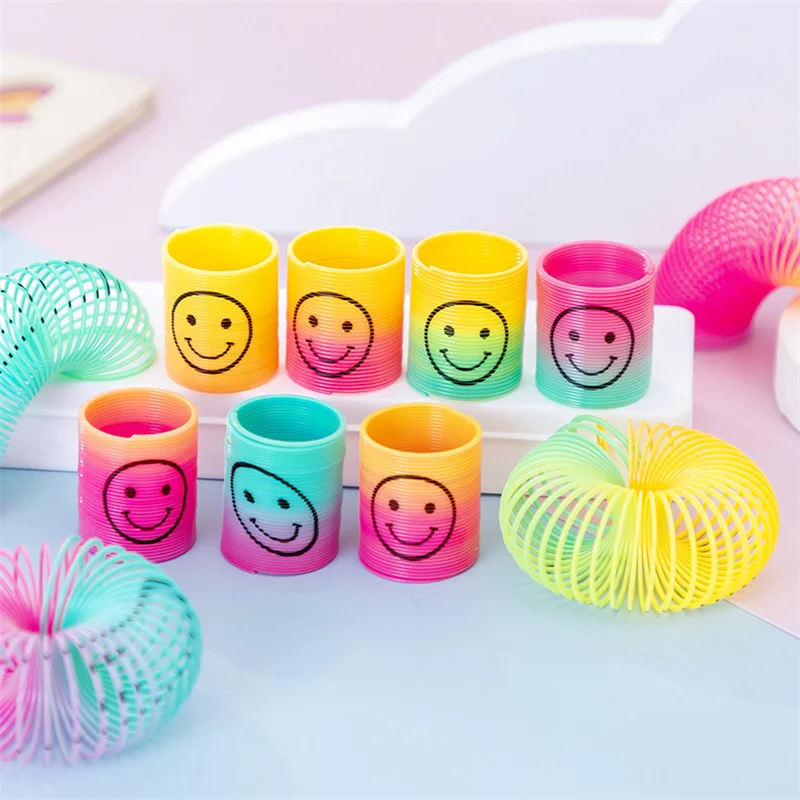12Pcs-Mini-Smiley-Face-Rainbow-Neon-Magic-Spring-Toys-Kids-Birthday ...