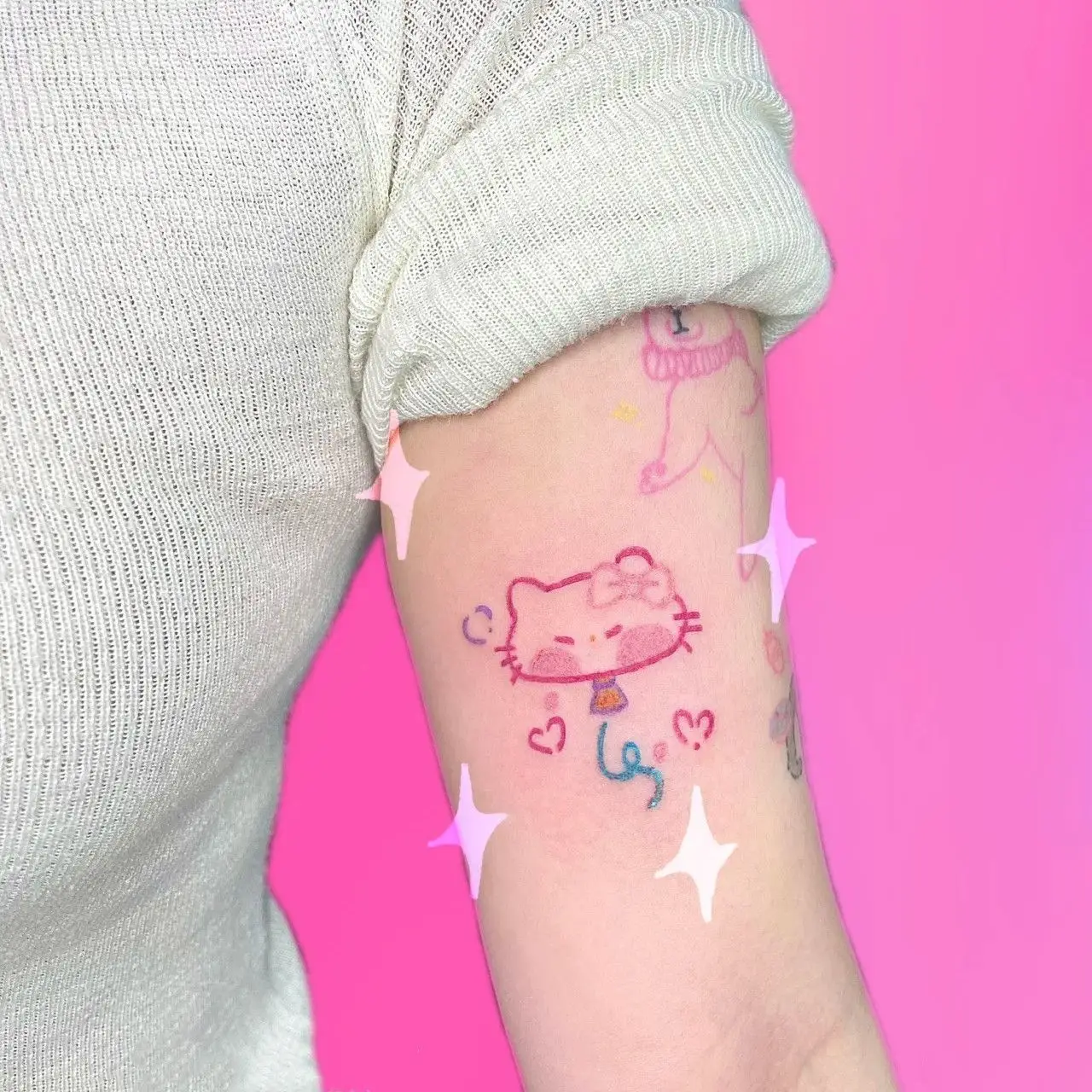 Hello Kitty Tattoos On Finger