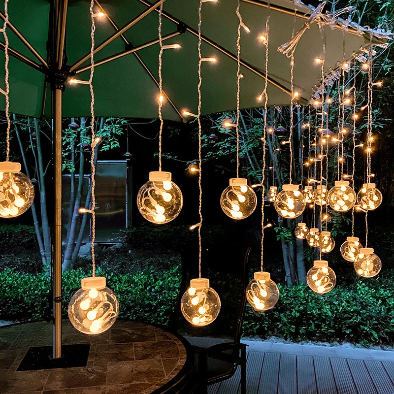 Ball String Lights Hung In A Room